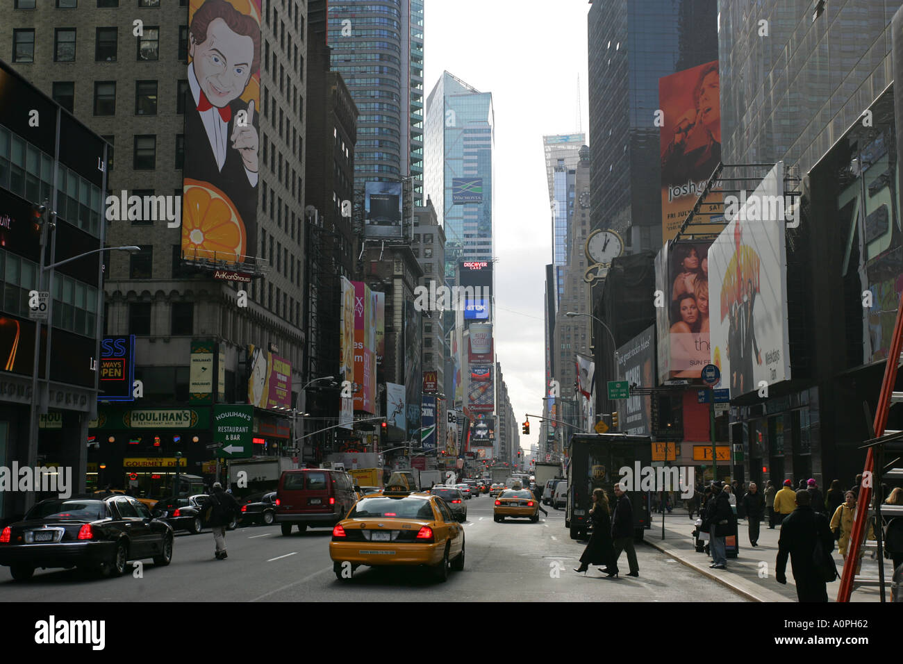 Gigantic billboard advertising and neon lights lead up to Times Square ...