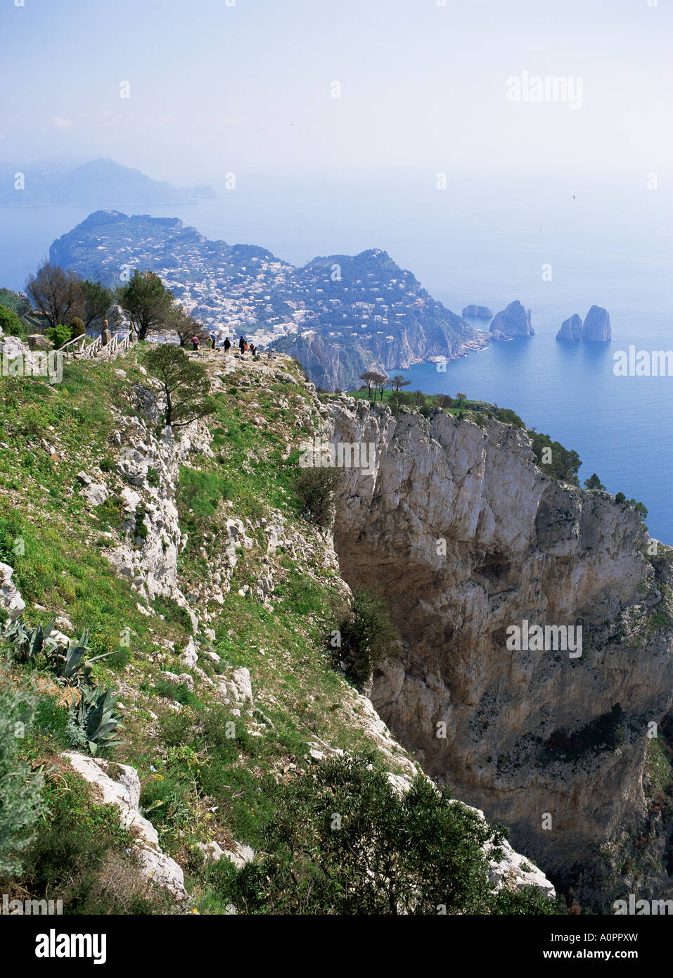 Distant Capri village and Faraglioni Rocks from Mount Solare the ...