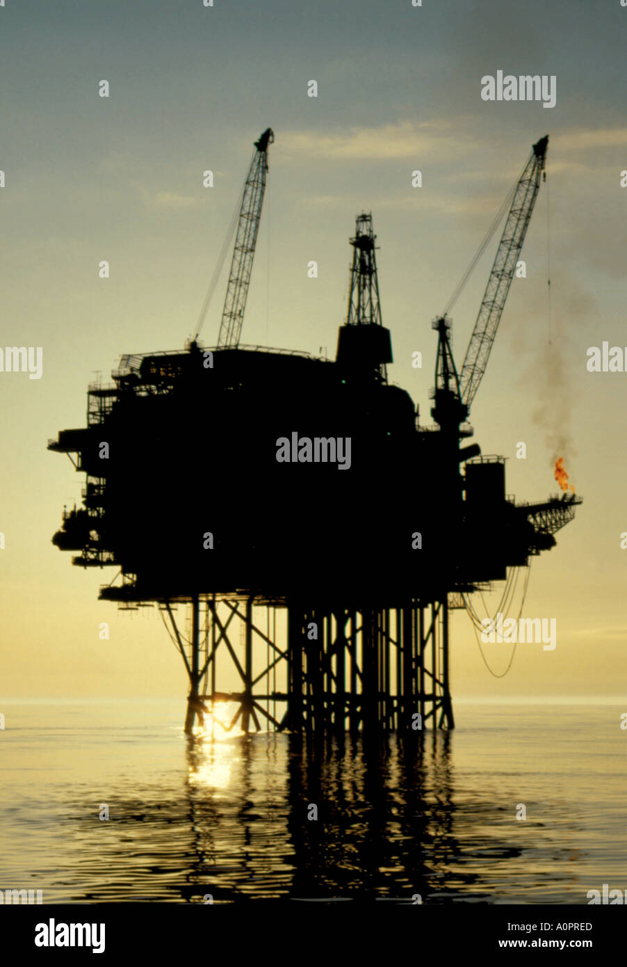 Ninian Northern North Sea oil platform at sunset Stock Photo - Alamy