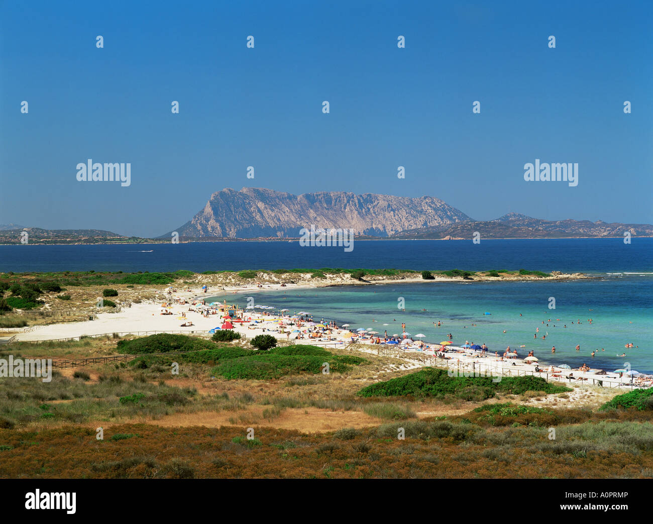 L Isuledda Beach and Isola Tavolara northeast coast island of Sardinia ...