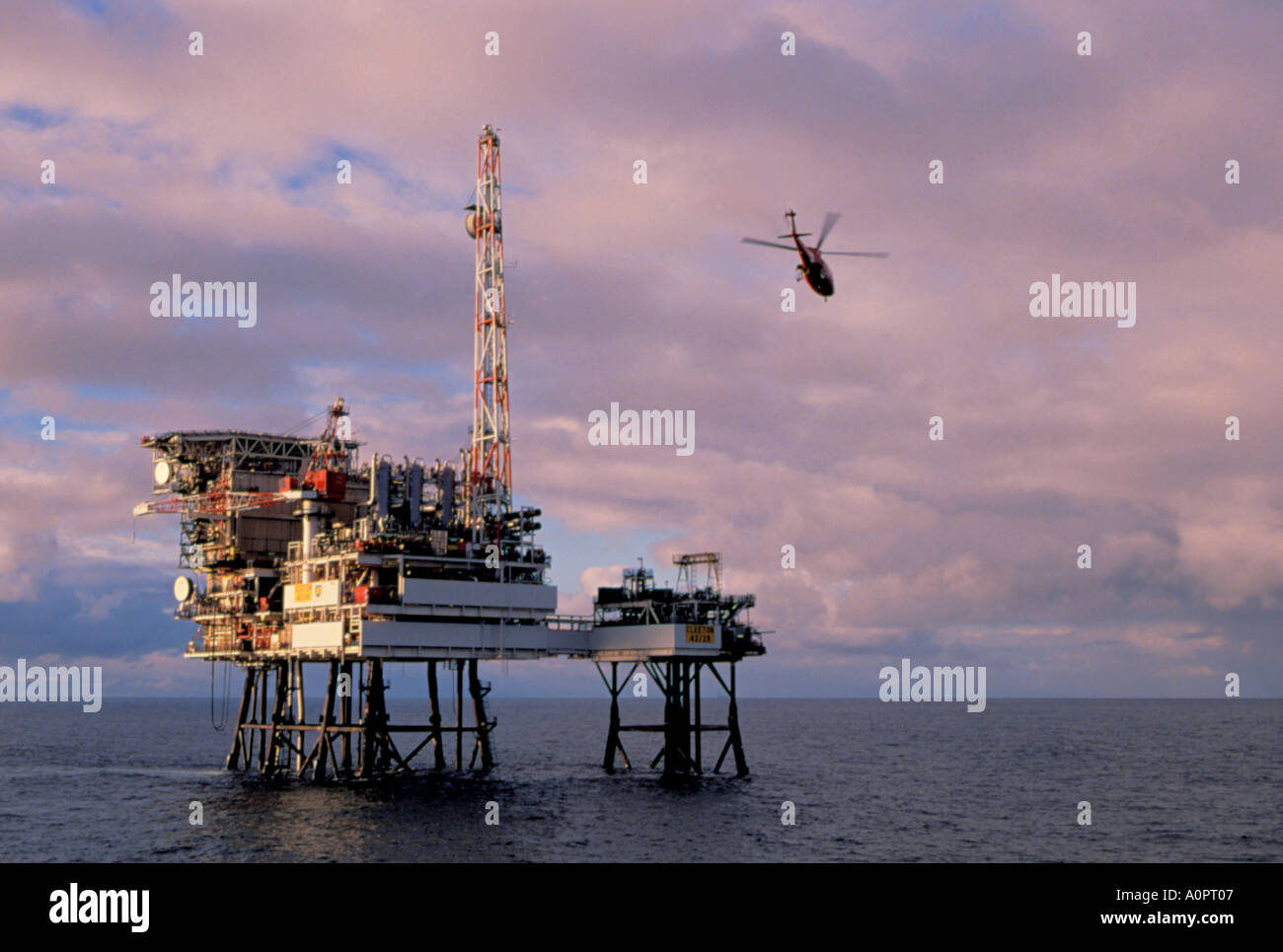 Helicopter leaving the Cleeton North Sea oil platform, UK Stock Photo ...
