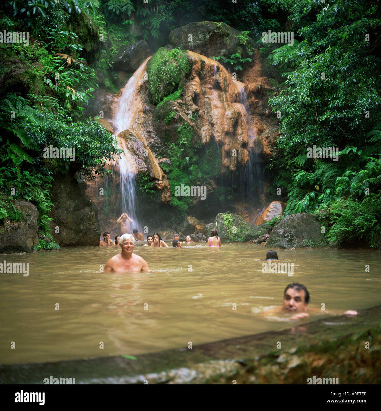 People bathing in volcanic pool island of Sao Miguel Azores Portugal ...