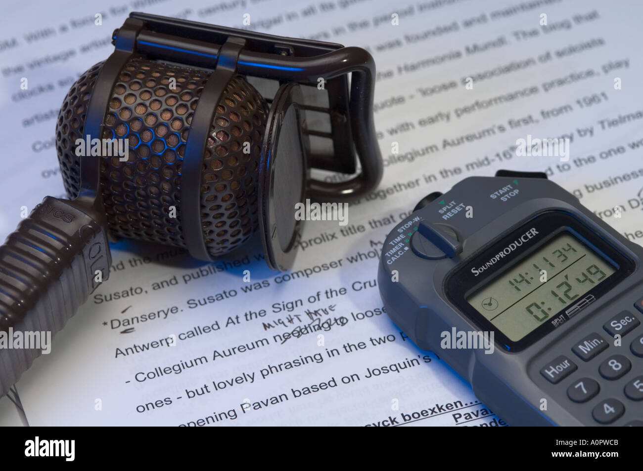 Script with announcer s microphone stopwatch Stock Photo - Alamy