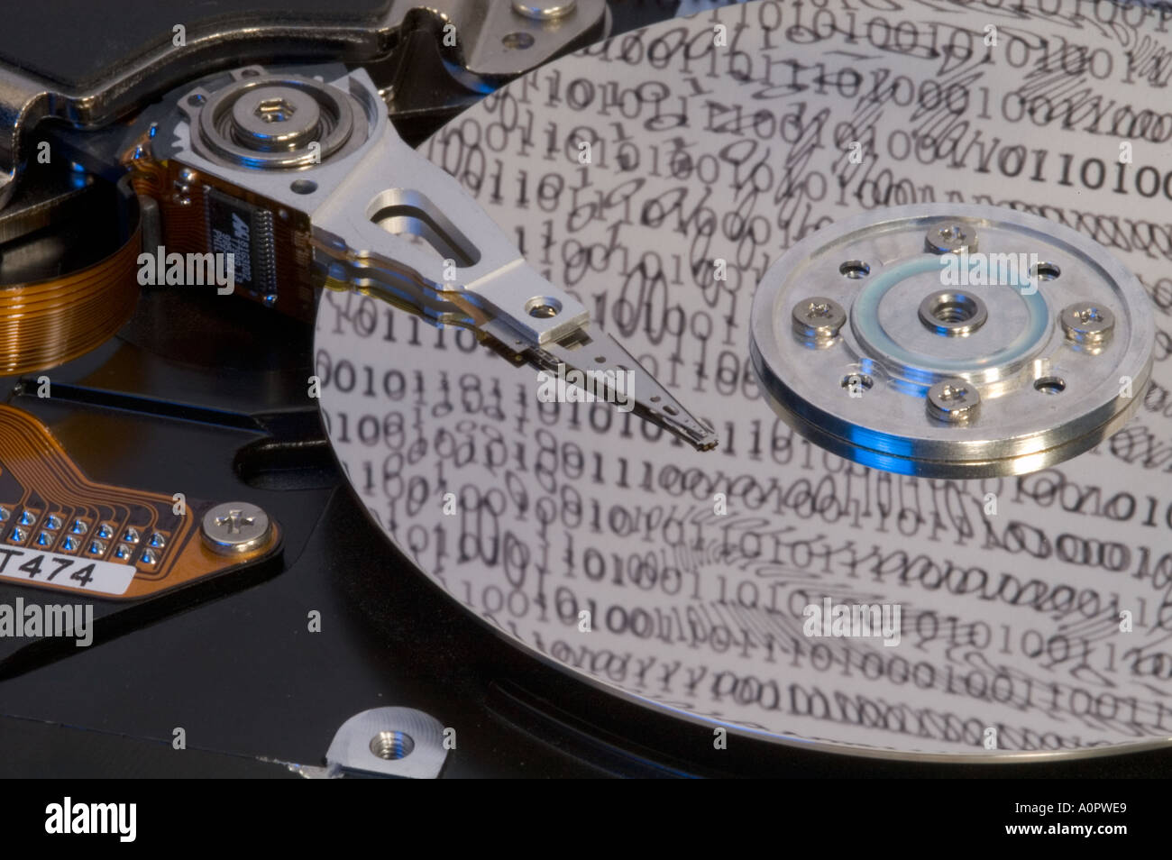Computer hard disc with binary data Stock Photo - Alamy