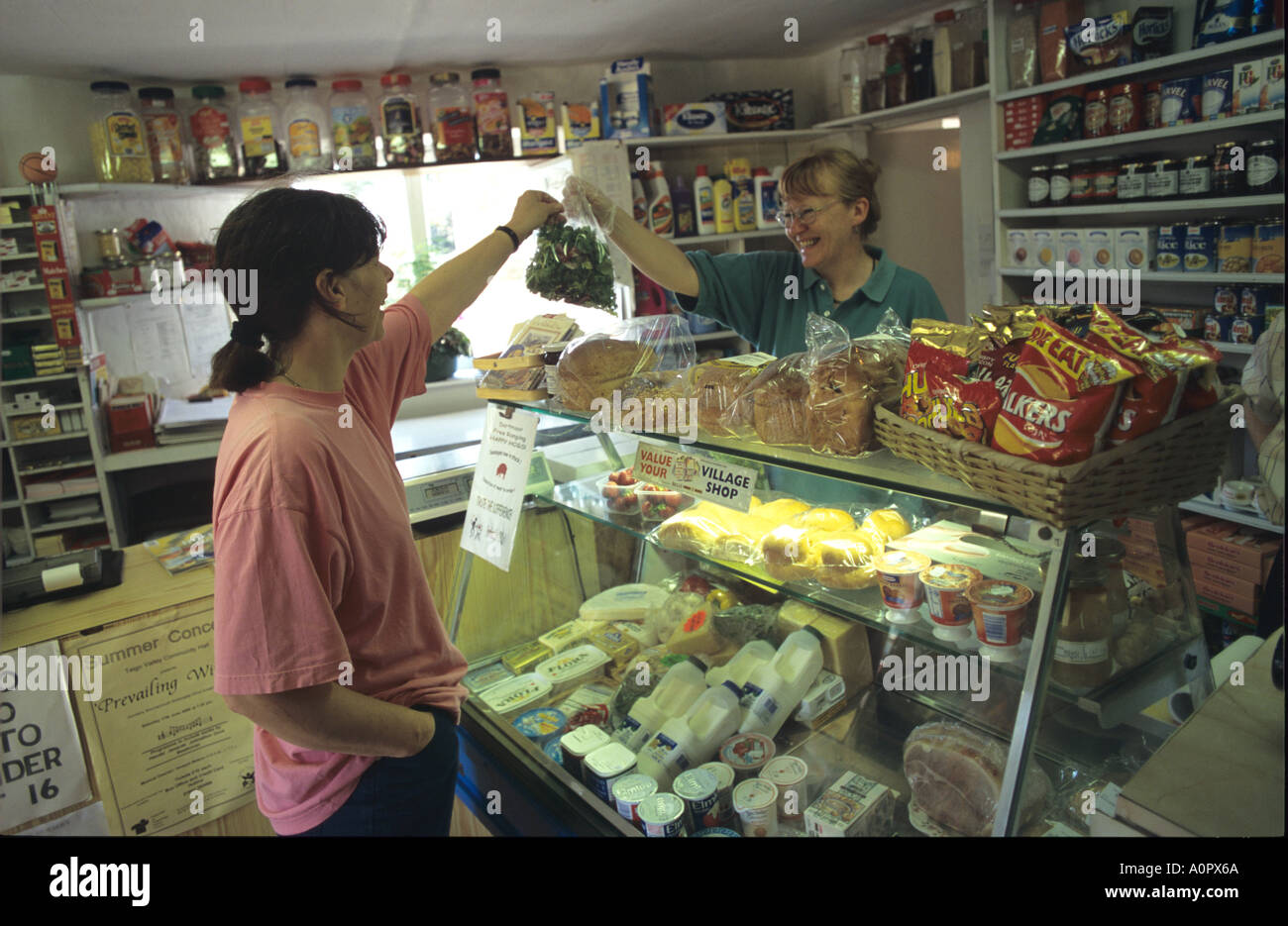 Busy village shop Stock Photo - Alamy