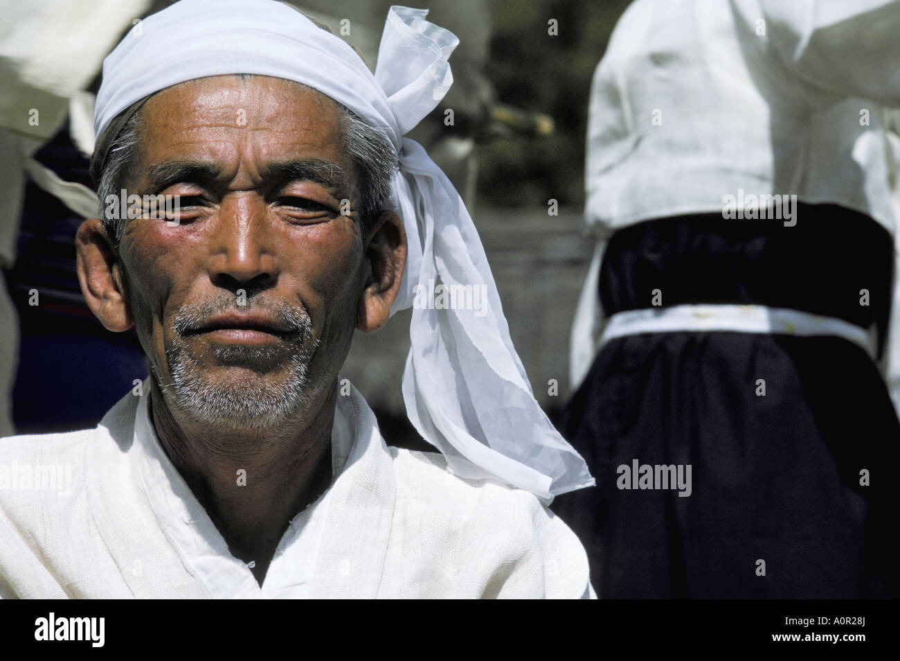 Portrait of a farmer during rice harvest festival Chindo Island South ...
