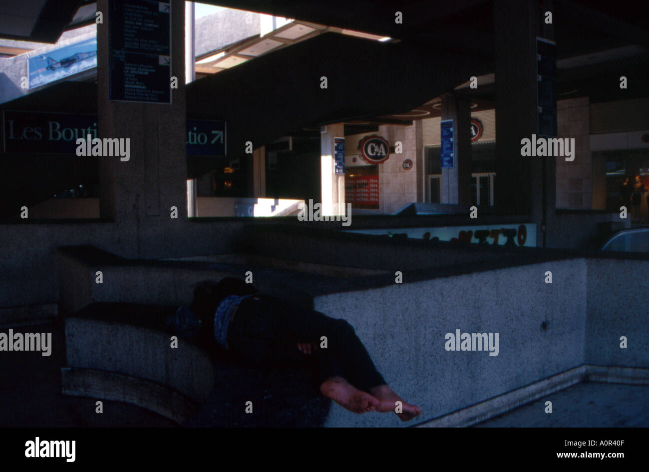 homeless sleeping on a public seat montparnass paris france Stock Photo ...
