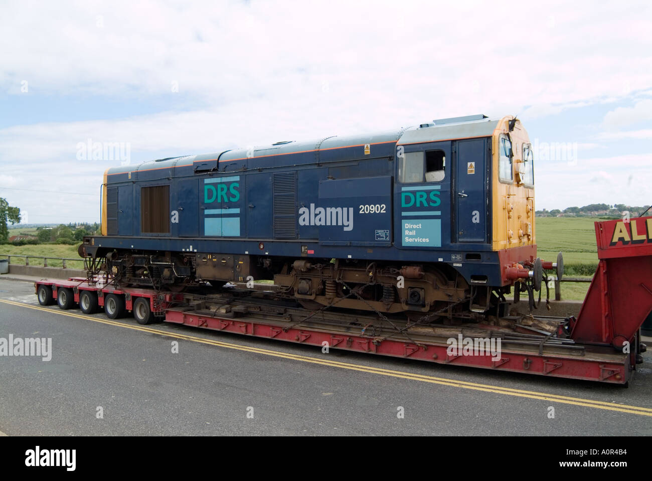 diesel train on the back of a lowloader transport lorry adnormal load ...