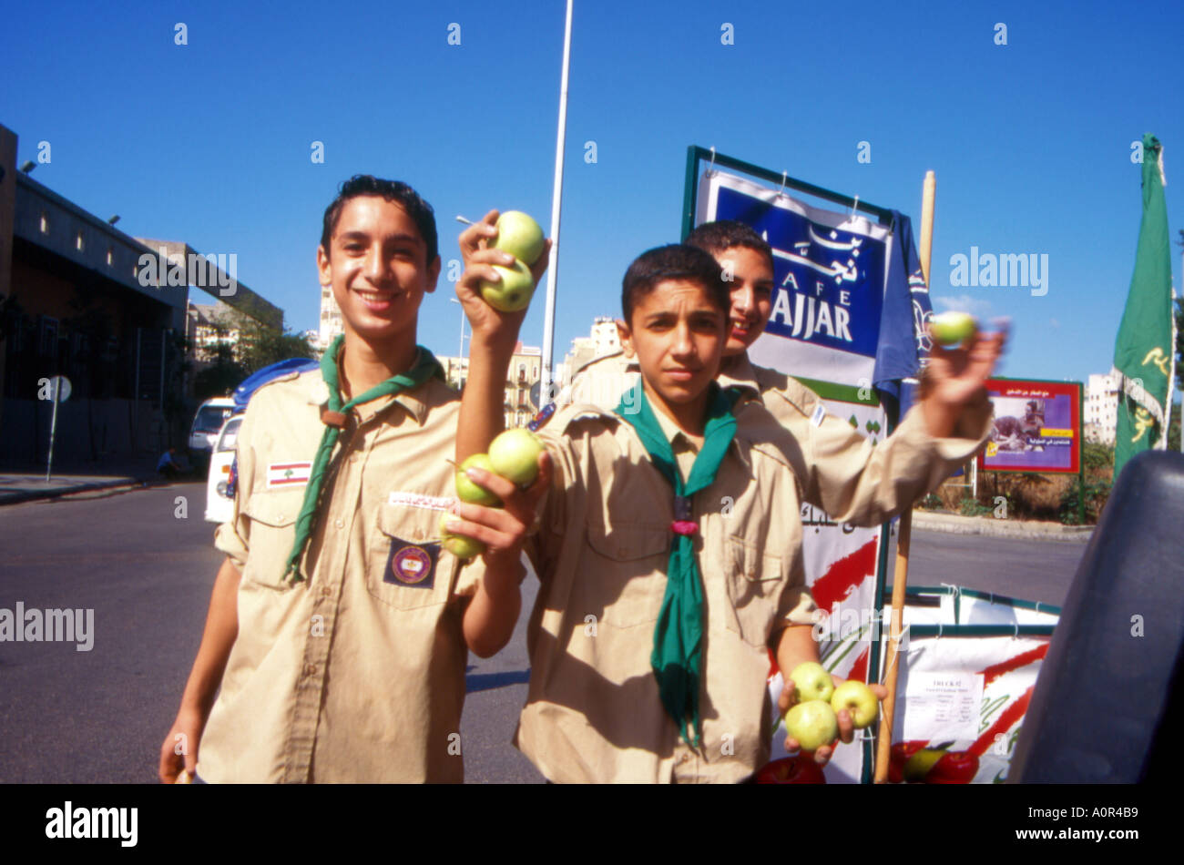 apple day scout offer apple to public beirut lebanon Stock Photo - Alamy