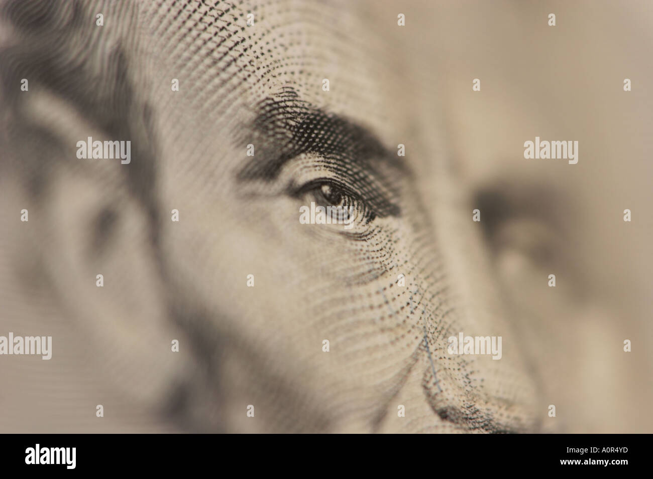 A close up of a U.S. five dollar bill showing a detail of Abraham ...