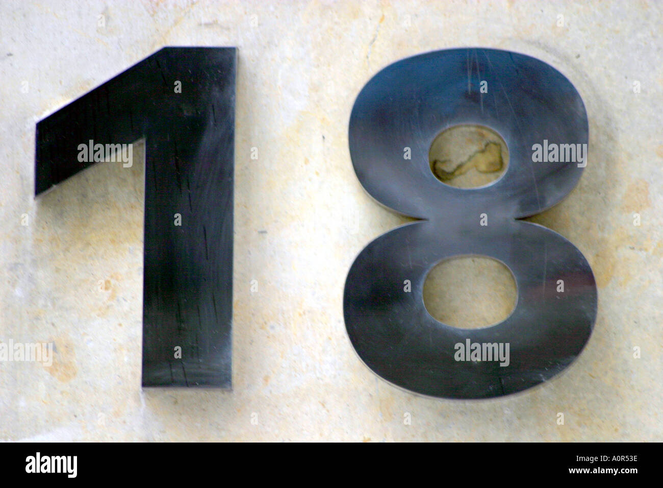 Number 18 on a building Stock Photo - Alamy
