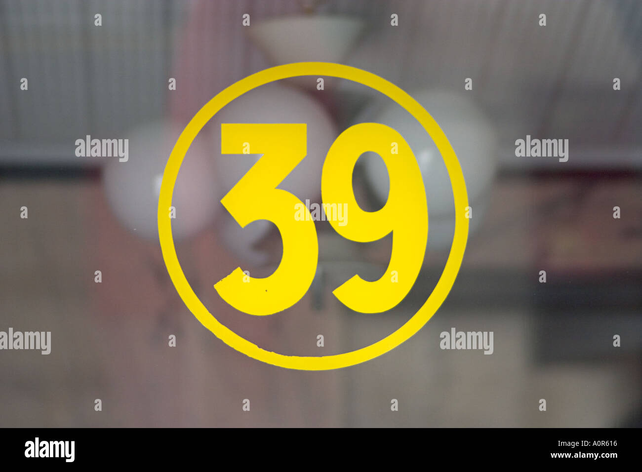 Modern building with number "39" painted on the glass door Stock Photo ...