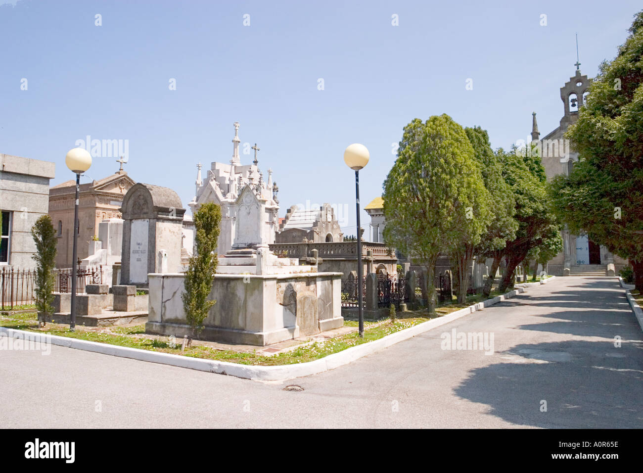Crossroads in a cemetery in Spain with tombs Stock Photo - Alamy