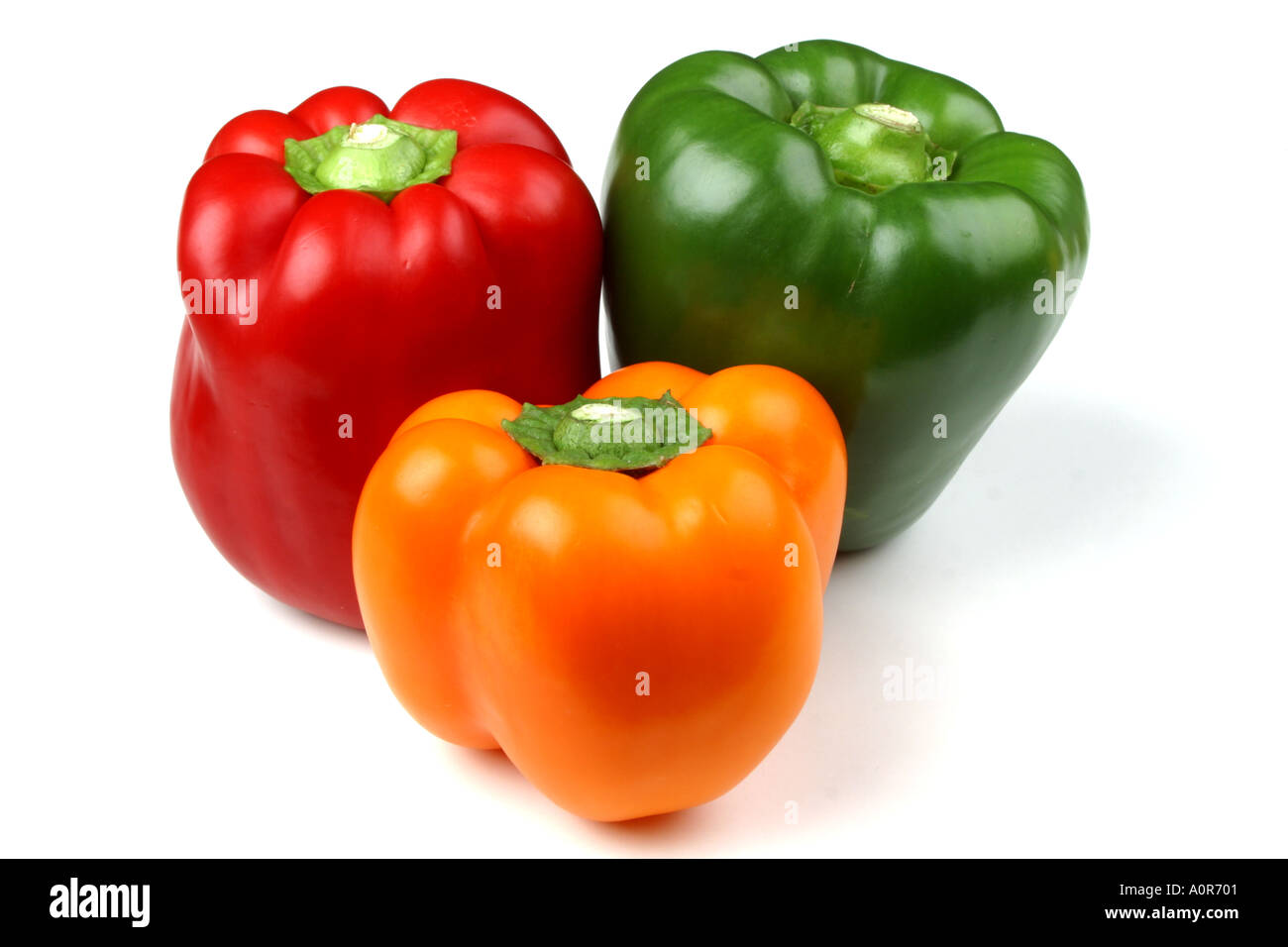 Mixed pepper still life on a white studio background Stock Photo - Alamy