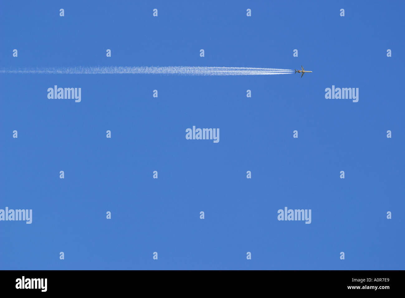 airplane and vapor trail Stock Photo - Alamy
