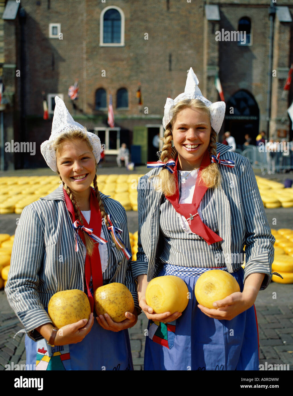 Women at cheese market Stock Photo - Alamy