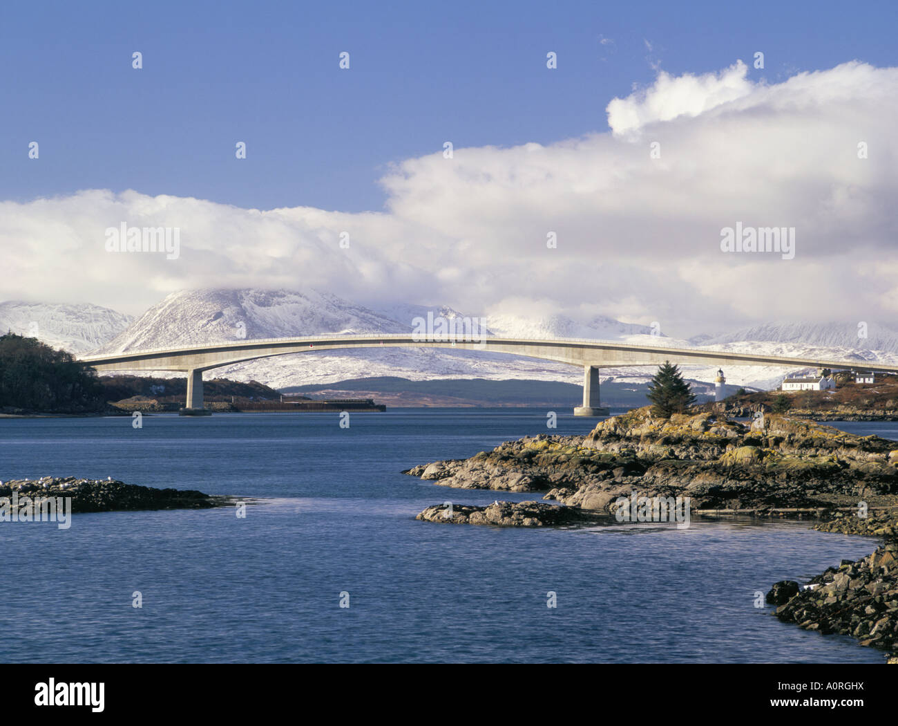 Skye bridge across Kyle Akin with snow on the mountains of Skye in late ...