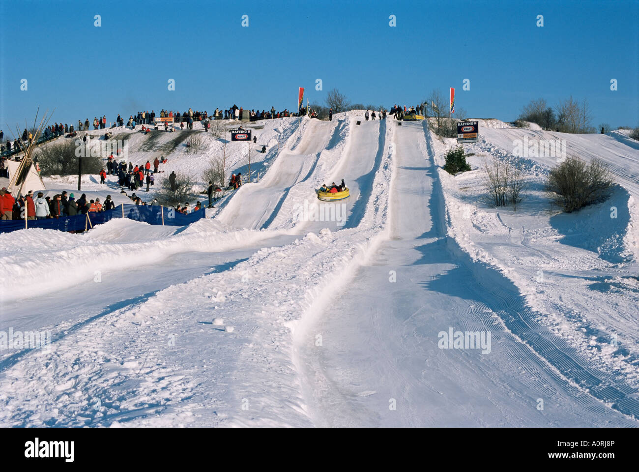 Sledding during winter carnival Quebec Canada North America Stock Photo ...