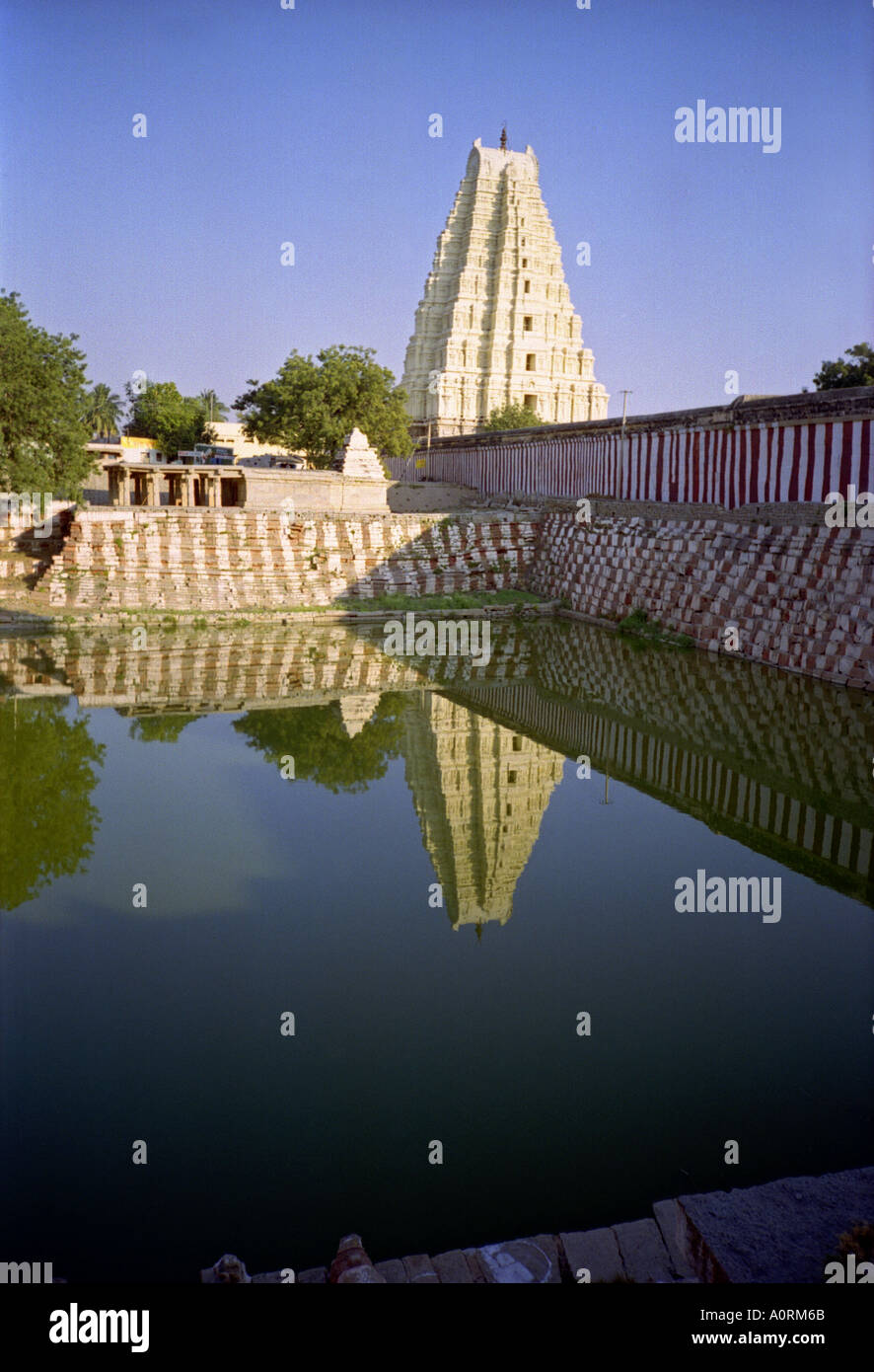 Magnificent decorated Hindu temple pyramid & mirror reflection in ...