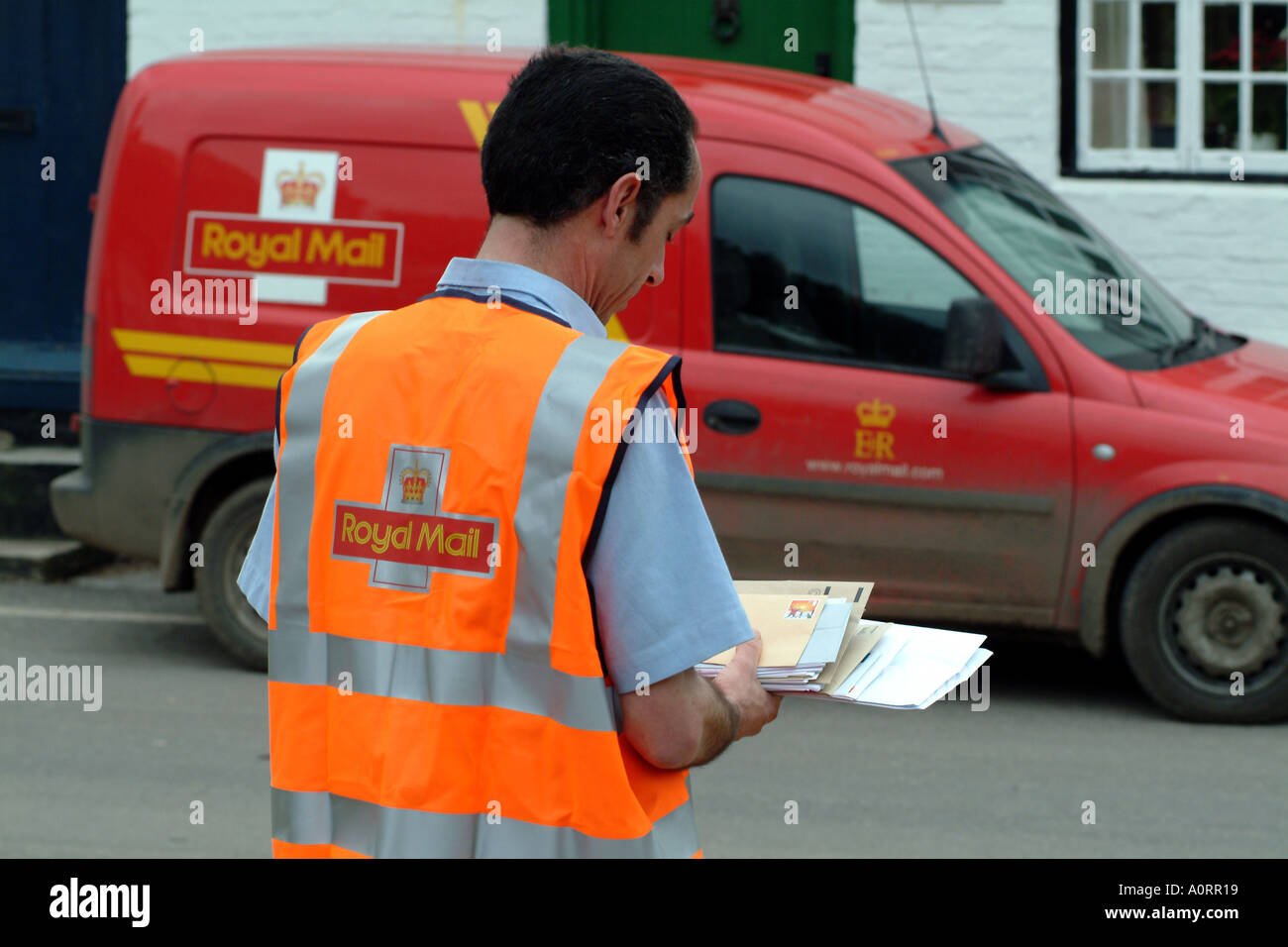 English postman uniform hi-res stock photography and images - Alamy