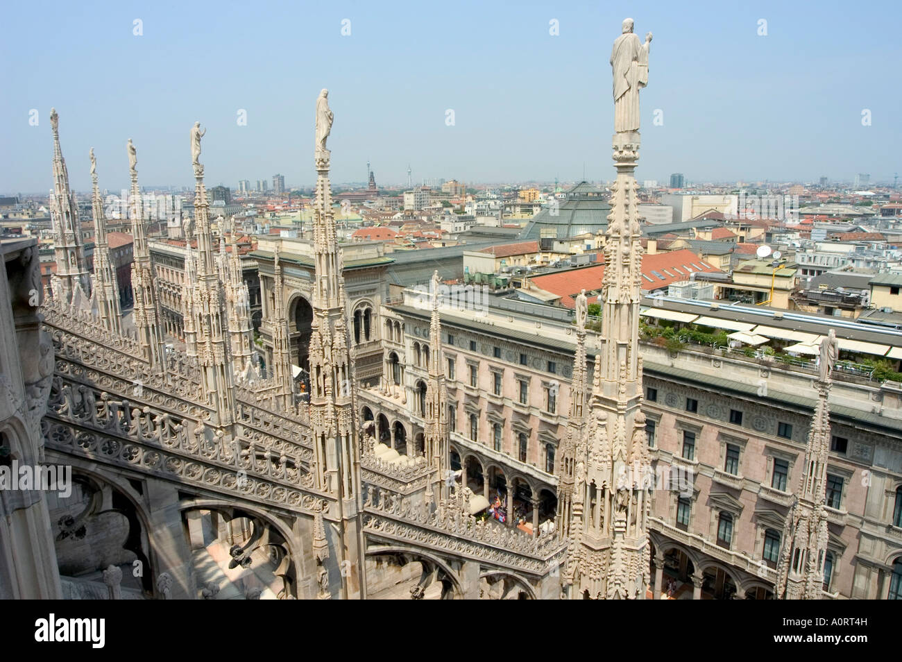 Rooftop spires of Duomo Cathedral and city Milan Lombardy Italy Europe ...