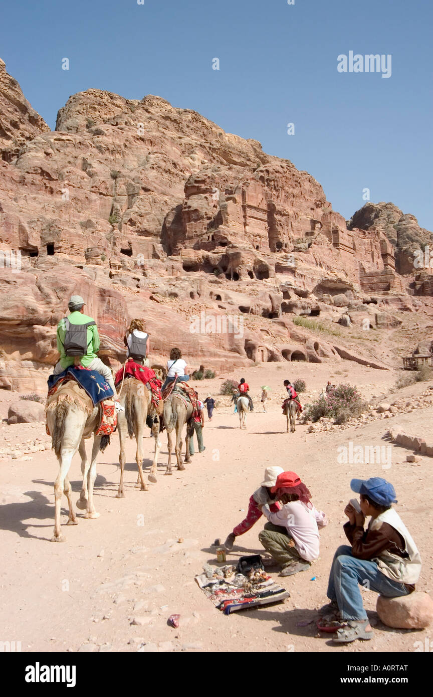 Tourist on camels in Petra UNESCO World Heritage Site Wadi Musa Mousa ...