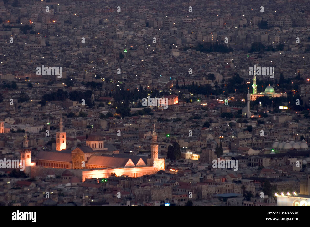 Aerial view of city at night including the Umayyad Mosque UNESCO World ...