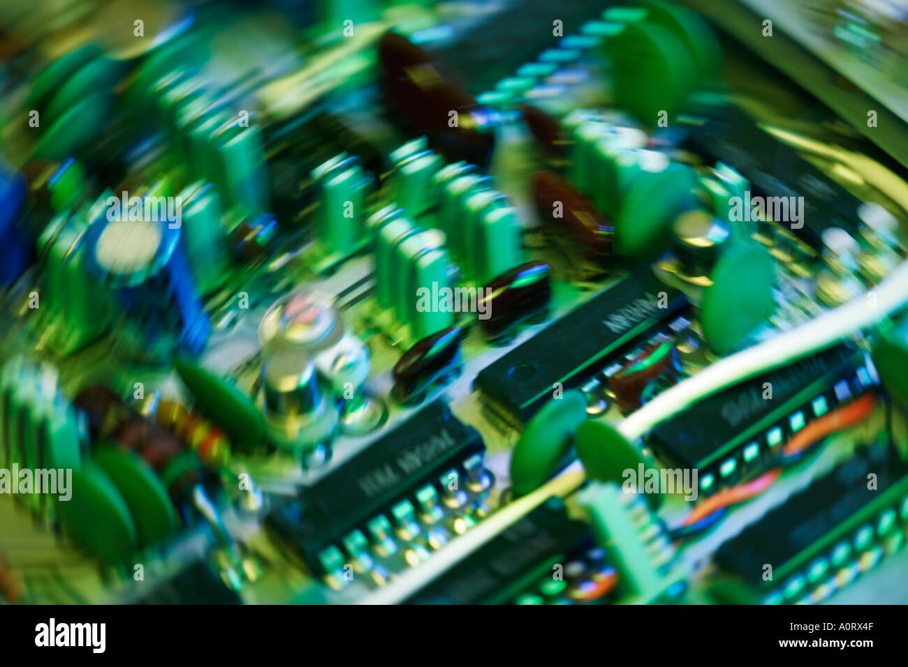 Close up of circuit board with IC microchips and with a circular motion ...