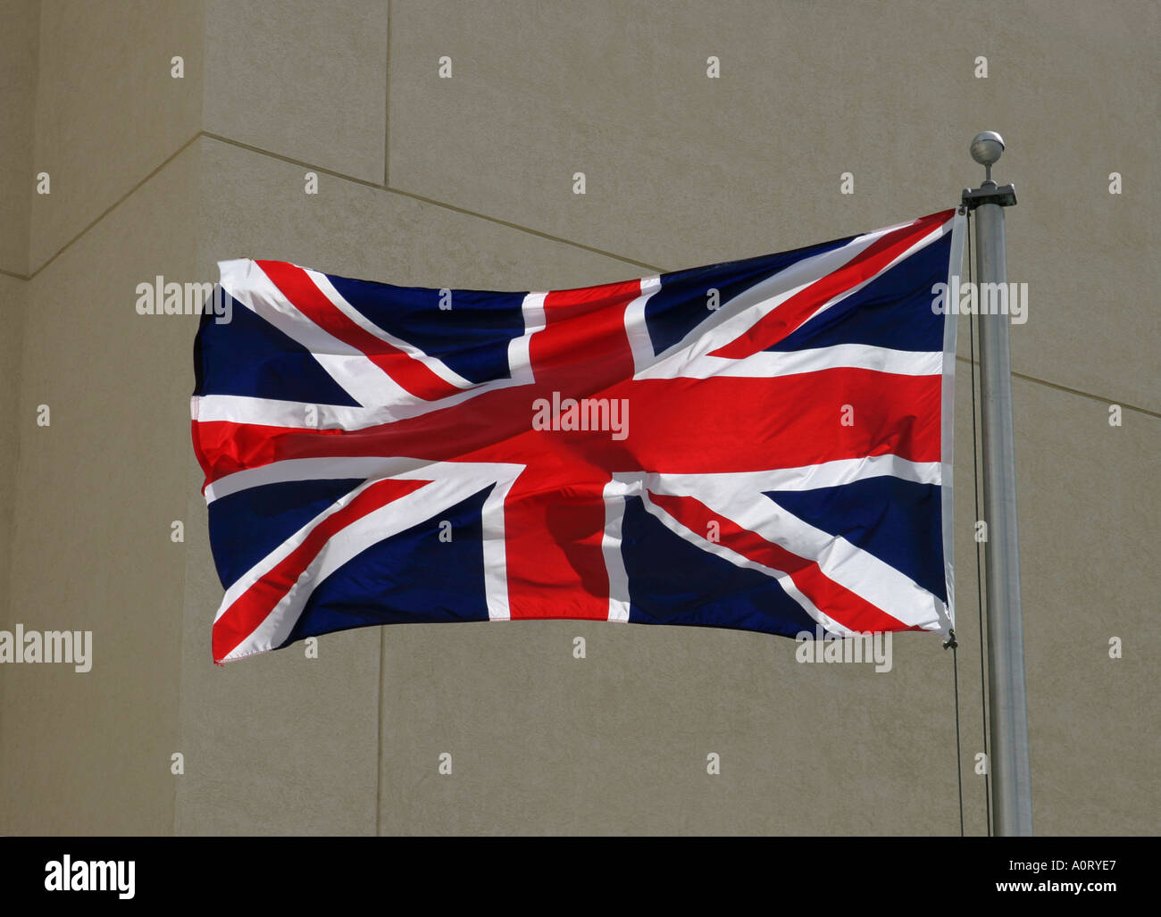 The British Union Jack flag flying in the wind Stock Photo - Alamy