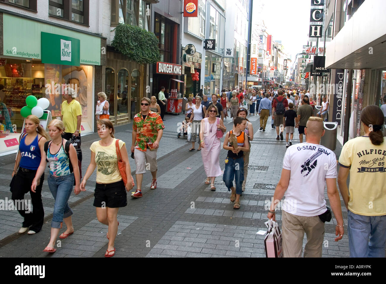 Street with many shops and people in cologne hi-res stock photography ...