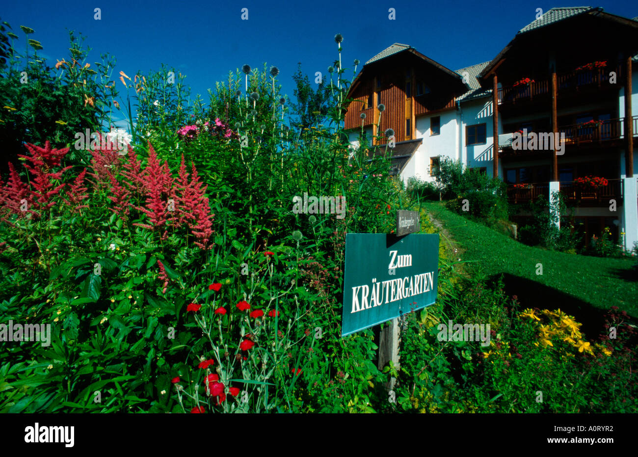 Hotel and herb garden / Irschen Stock Photo - Alamy