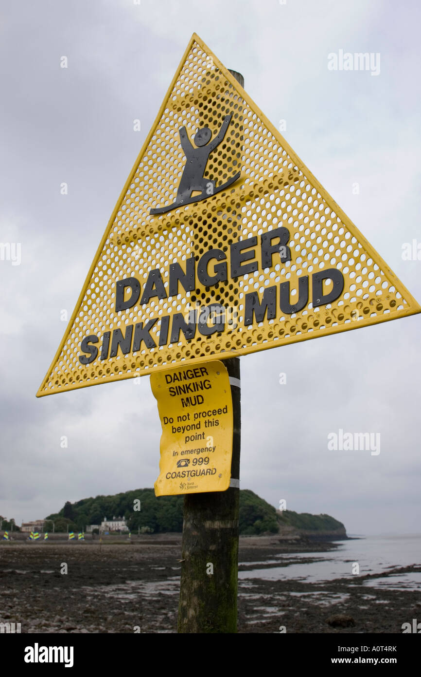 Danger sinking mud sign Stock Photo - Alamy