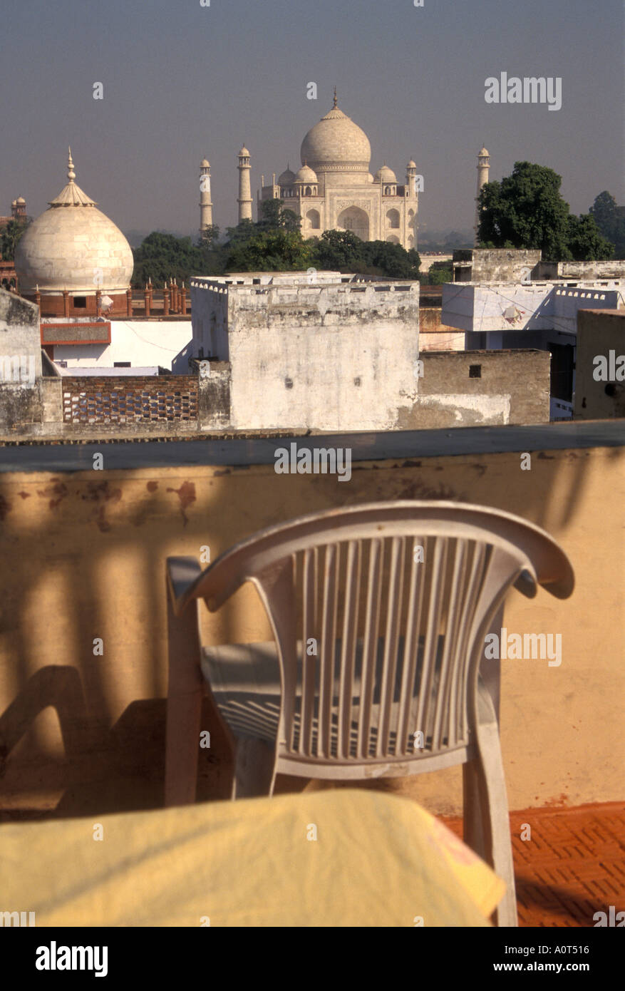 Plastic chair in rooftop Agra restaurant Stock Photo - Alamy