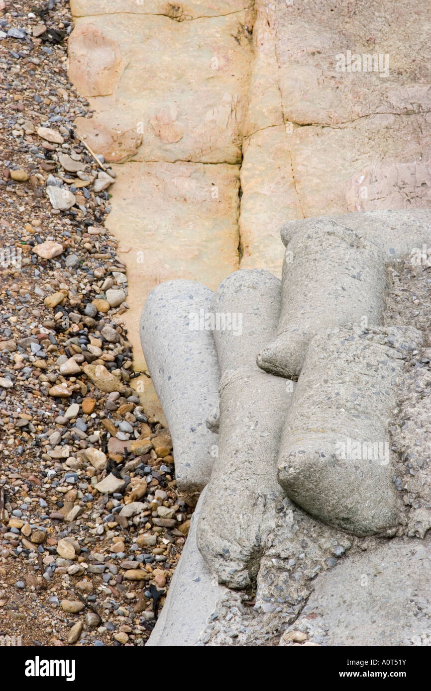 Cement sandbags as part of sea wall defence Stock Photo - Alamy