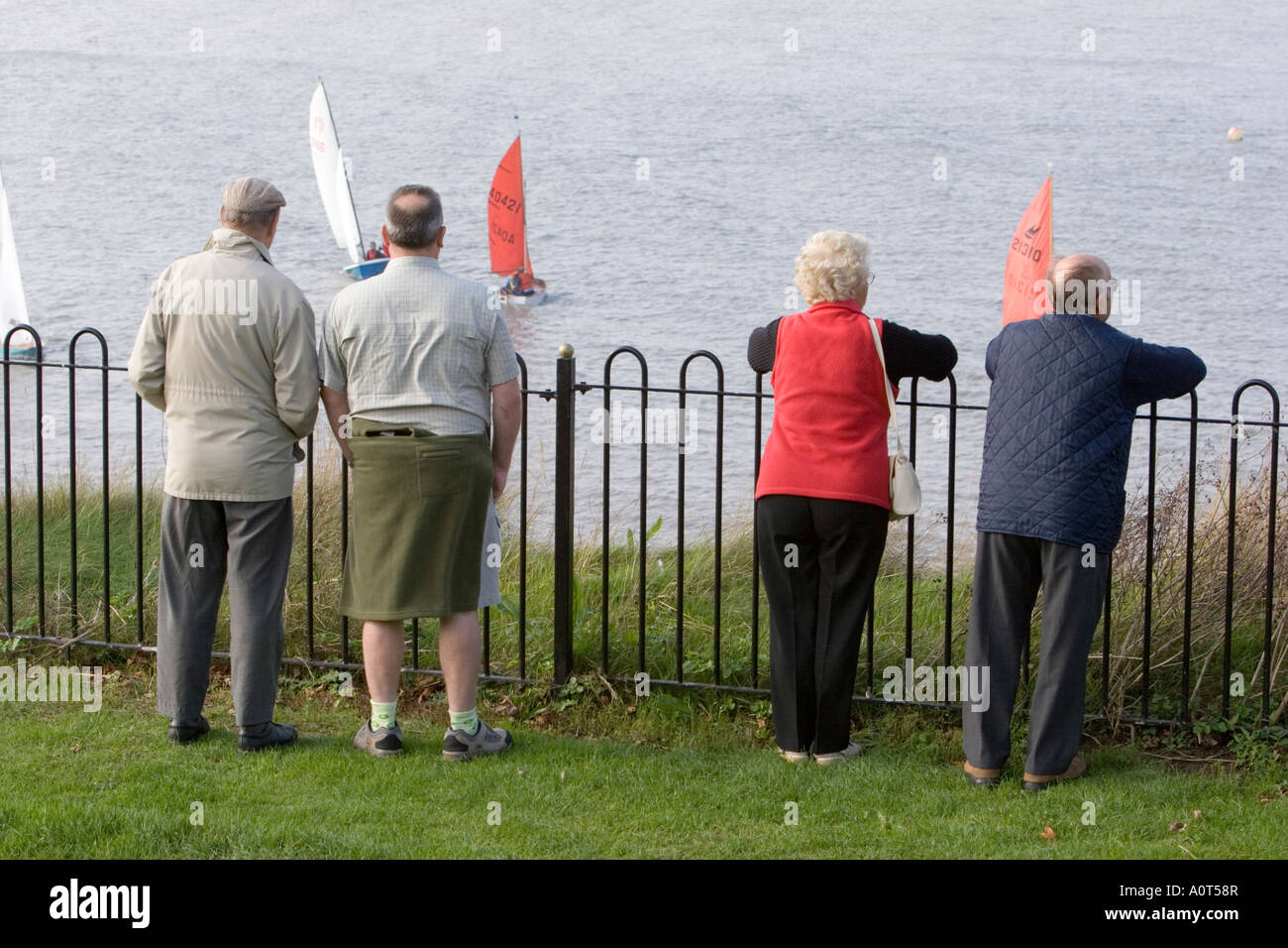 Lady watching boats hi-res stock photography and images - Alamy
