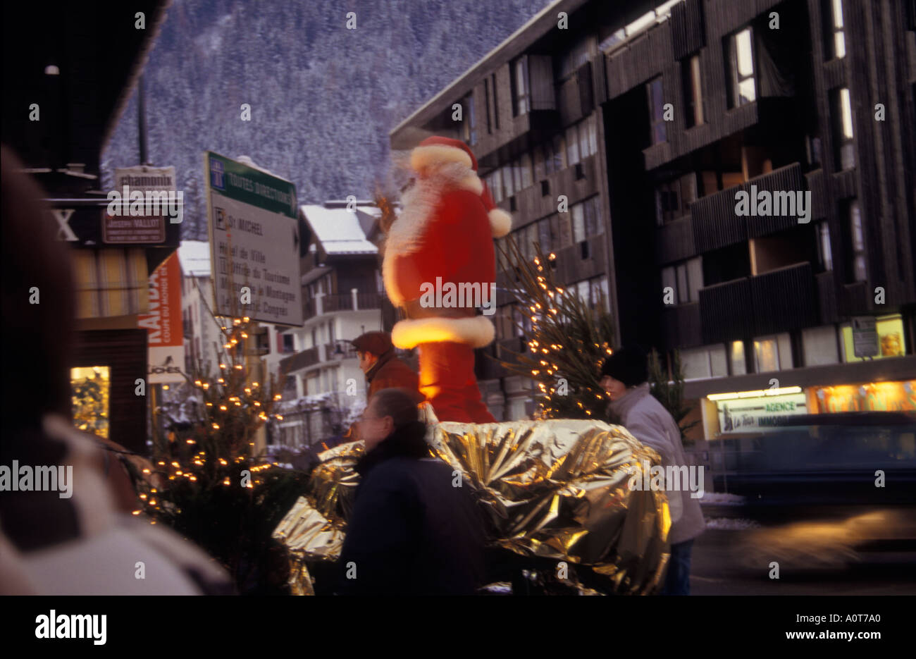 Santa Claus parade on Christmas Eve in Chamonix France Stock Photo - Alamy