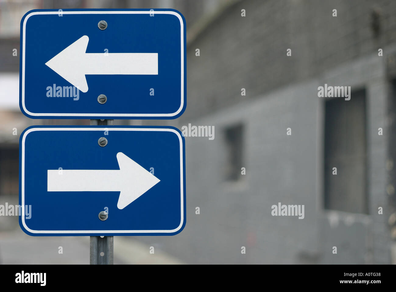 Sign Pointing Opposite Directions