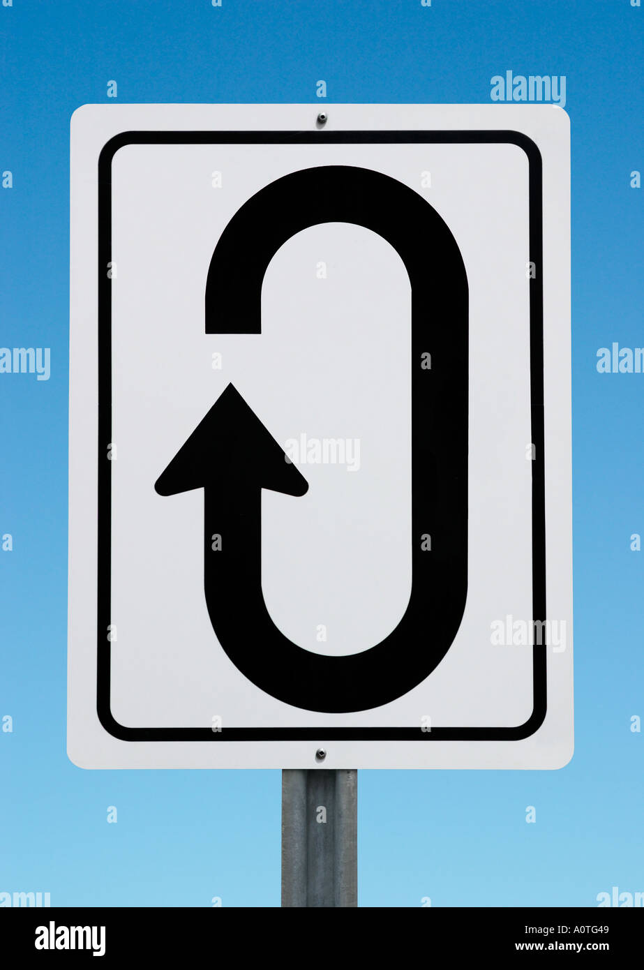 Road sign with circular black arrow suggesting repetition or an endless ...
