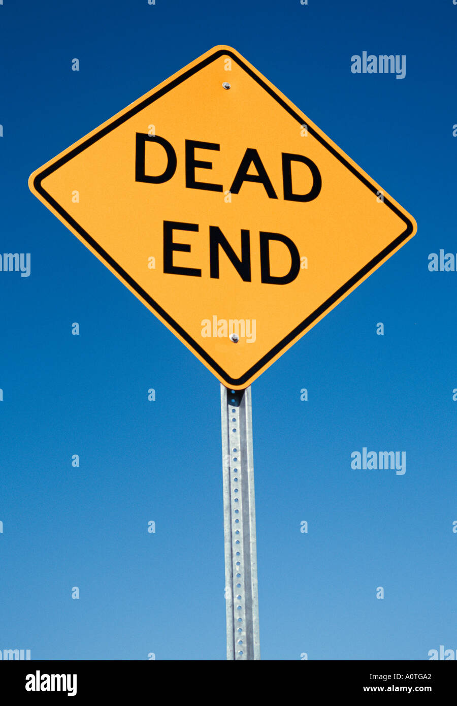 DEAD END sign with a clear blue sky background Stock Photo - Alamy