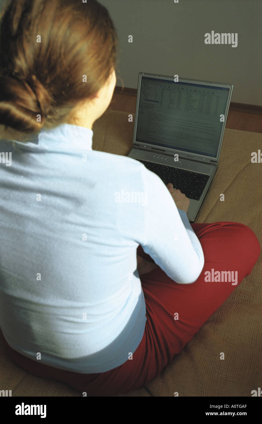 Pregnant woman with laptop Stock Photo - Alamy