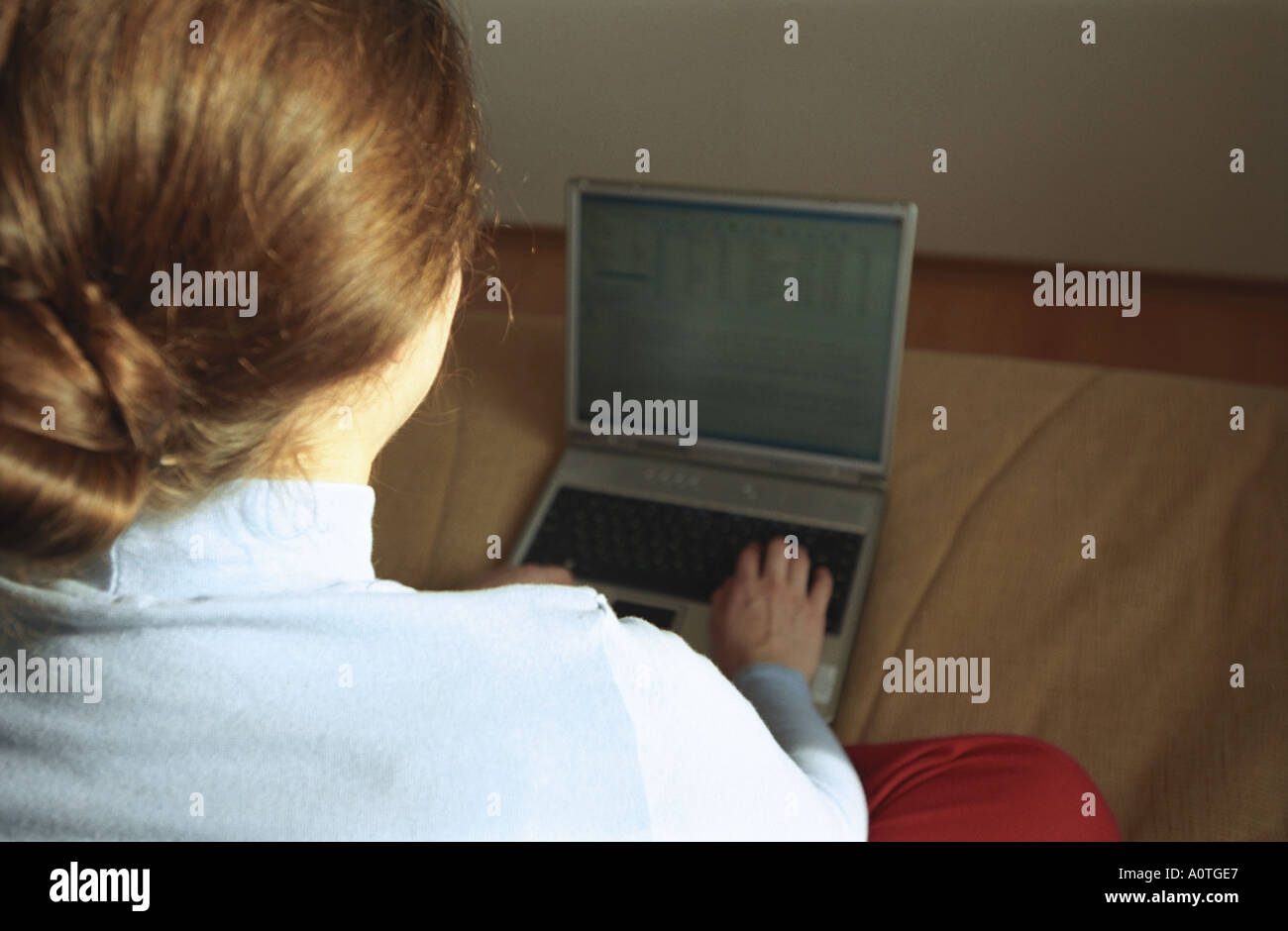 Pregnant woman with laptop Stock Photo - Alamy