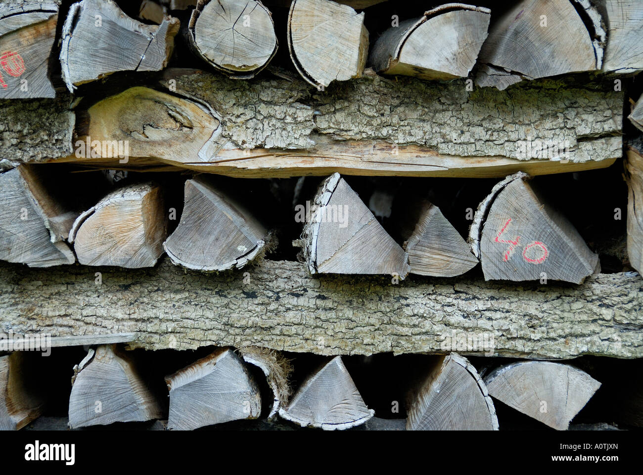 "Stacked "apple wood" firewood, France Stock Photo - Alamy