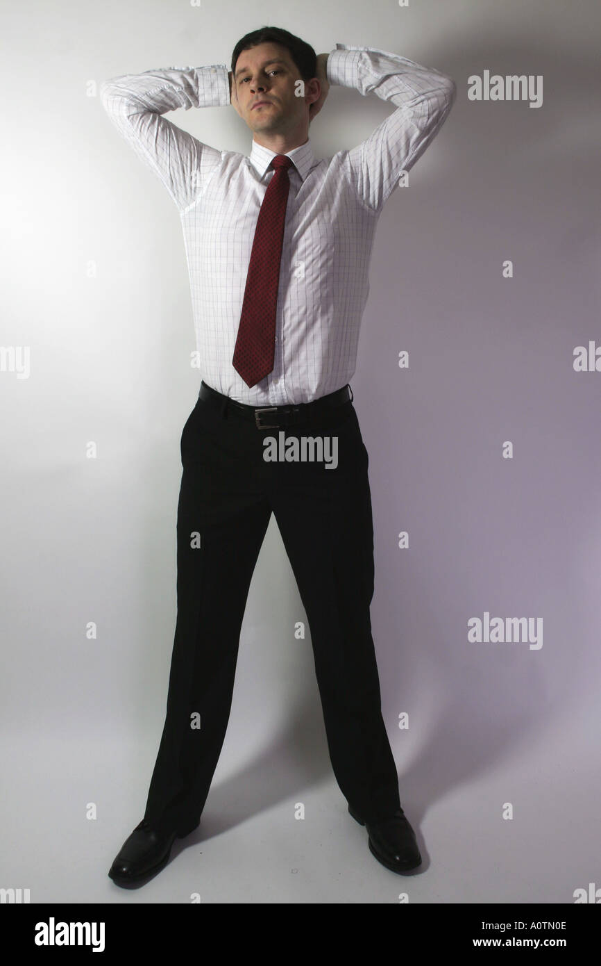 Suit arms behind head hi-res stock photography and images - Alamy