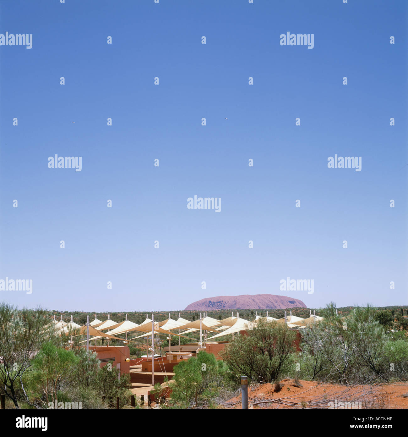 Ayres Rock from Yulara Resort World Heritage Stock Photo - Alamy