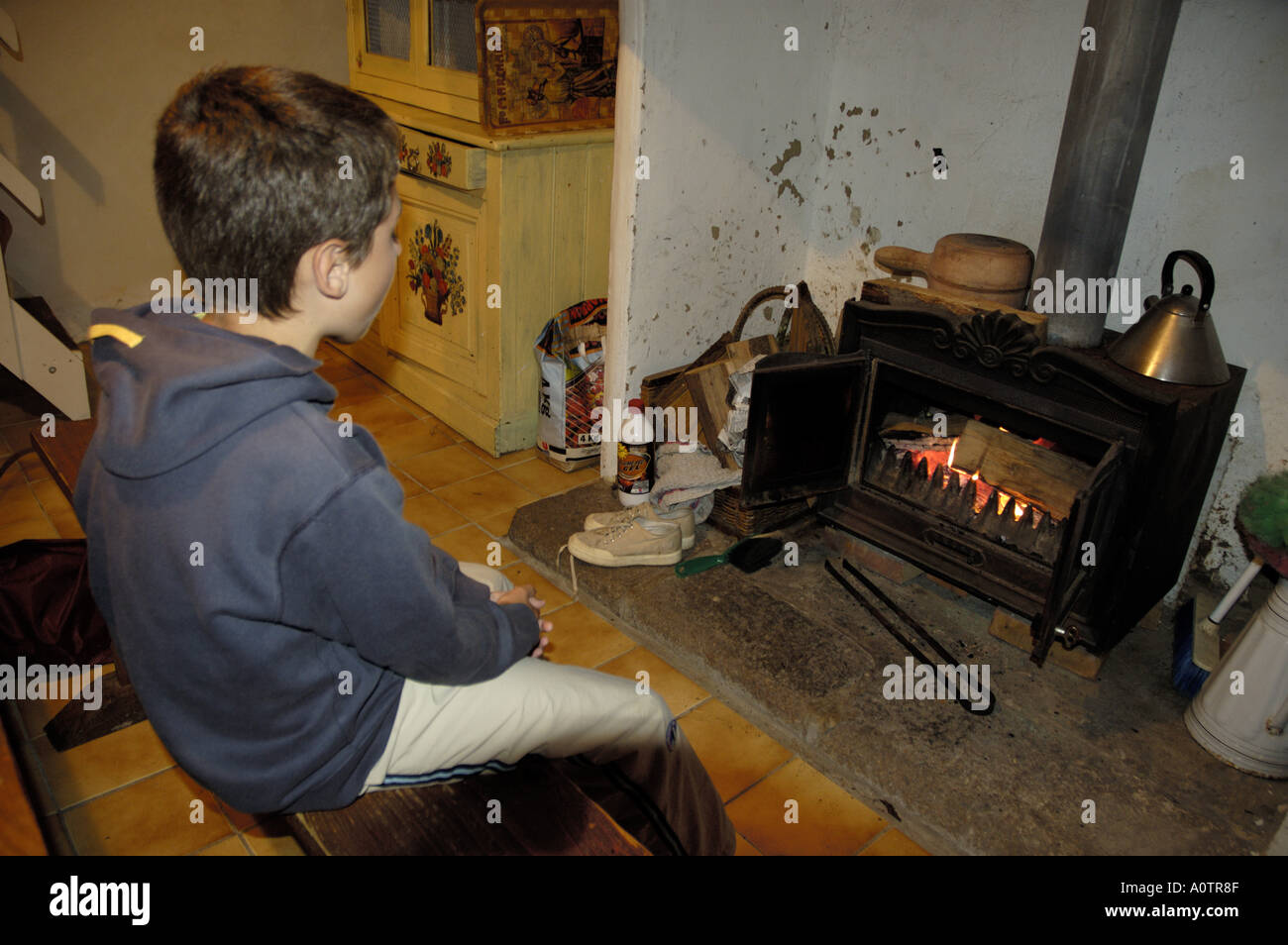 Old Man Watching Fire High Resolution Stock Photography and Images - Alamy