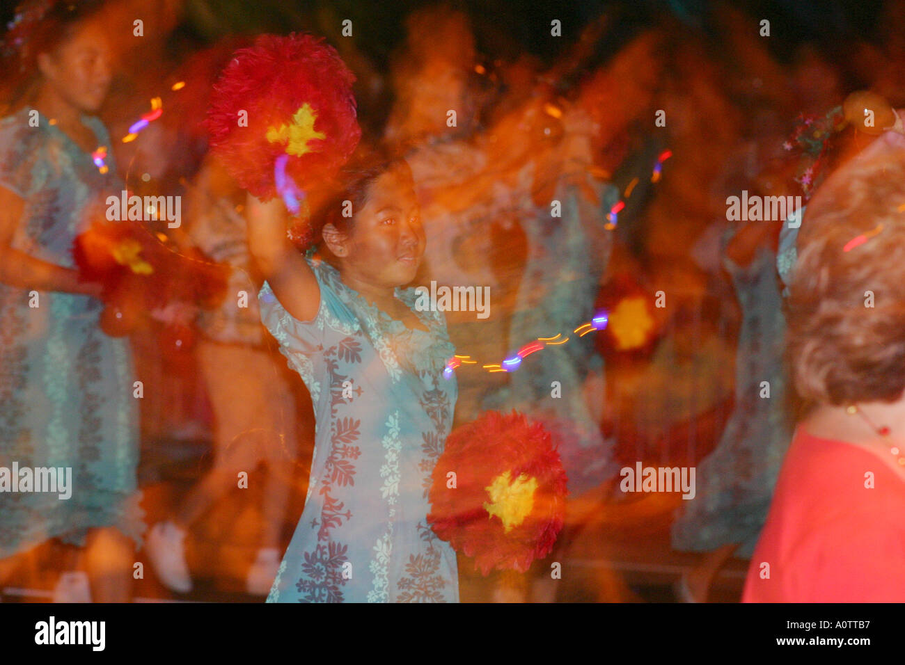 Hula dancing girls at annual Christmas holiday parade of lights ...