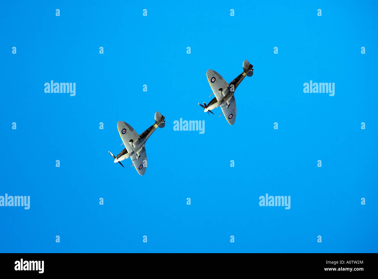 Two Spitfires in flight at Duxford Stock Photo - Alamy