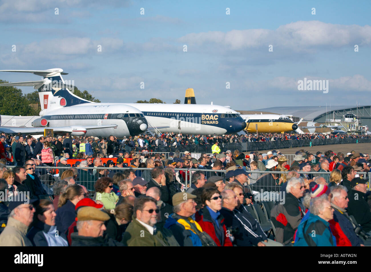 A crowd watch the aerial displays at a Duxford Airshow 2006 Stock Photo ...