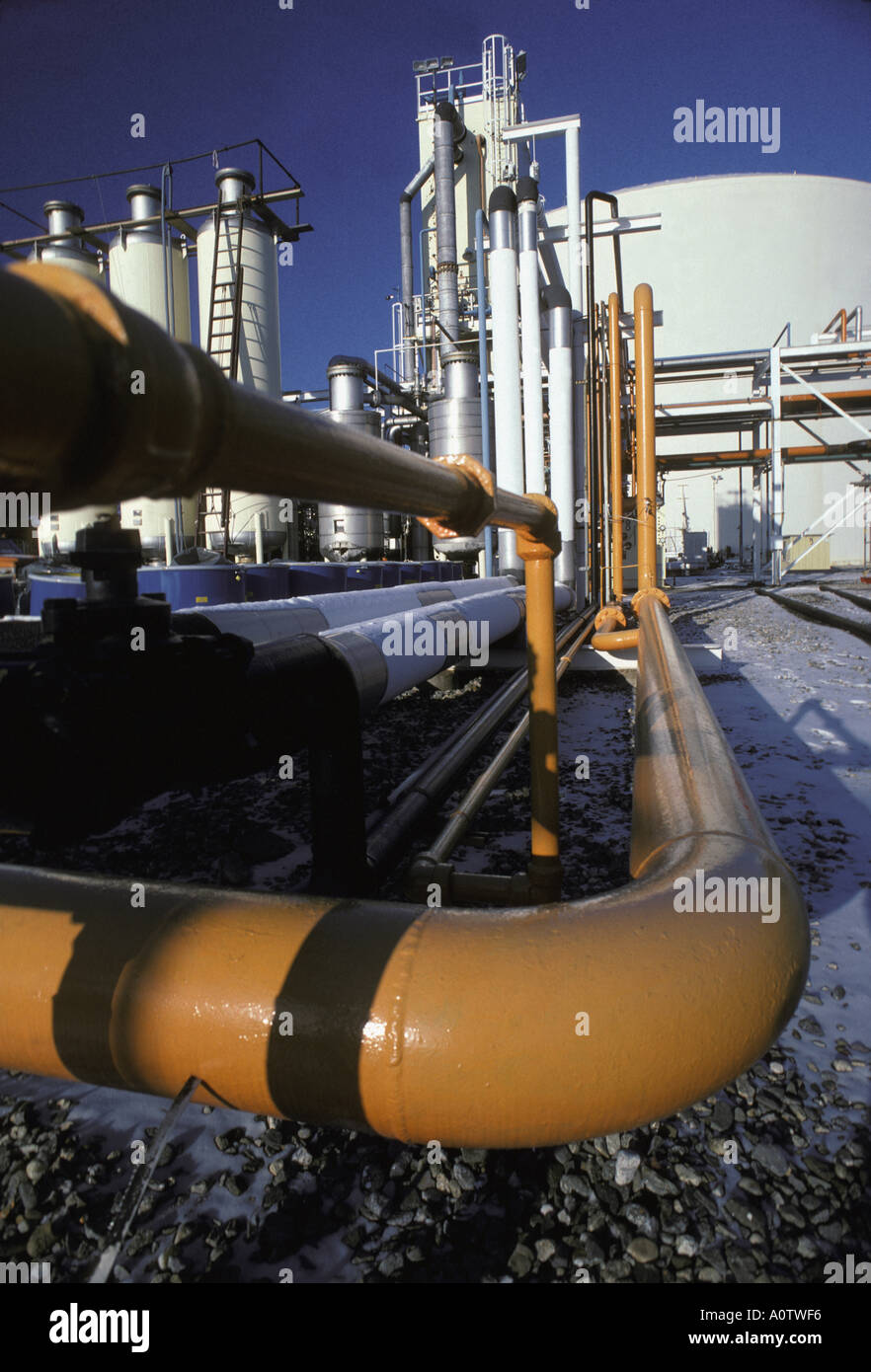 Pipelines and storage tanks at a natural gas compressor station Stock ...