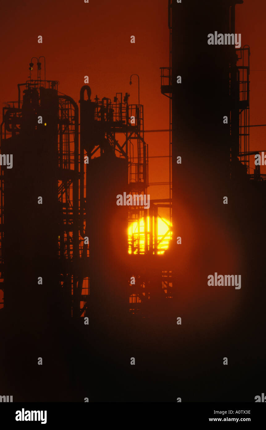 fractionating towers at Texas petrochemical plant at sunset Stock Photo ...